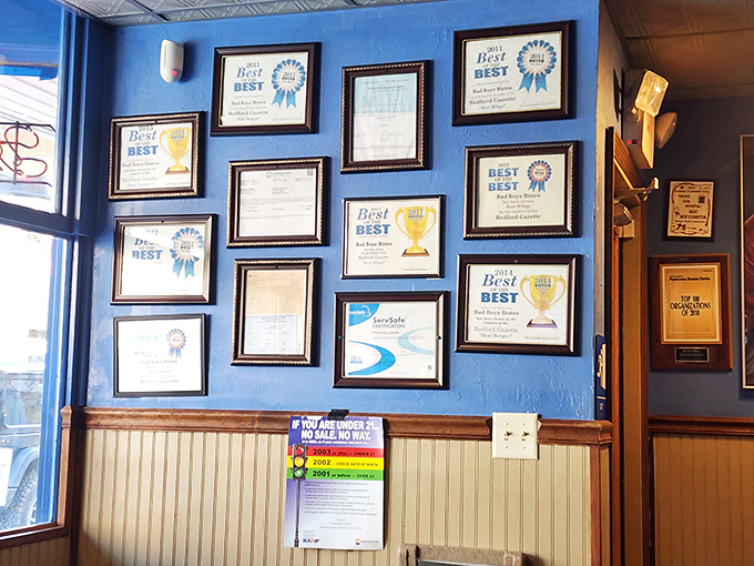 A wall of awards that says "we're not bragging, but actually yes, we are"&mdash;years of local recognition displayed with well-deserved pride.
