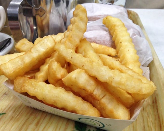 Crinkle-cut fries with the perfect golden exterior. These aren't just side dishes&mdash;they're supporting actors worthy of their own spotlight.