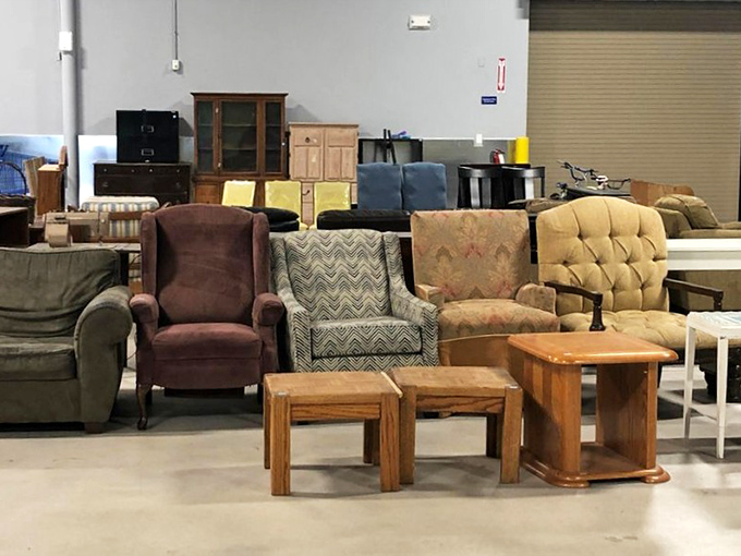 The furniture section – where mid-century meets last-Tuesday in a showroom of possibility. That tufted chair has stories to tell if you're willing to listen.