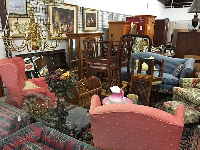 Furniture Tetris at its finest. Somewhere in this beautiful jumble is the perfect pink chair that will complete your living room's redemption arc.