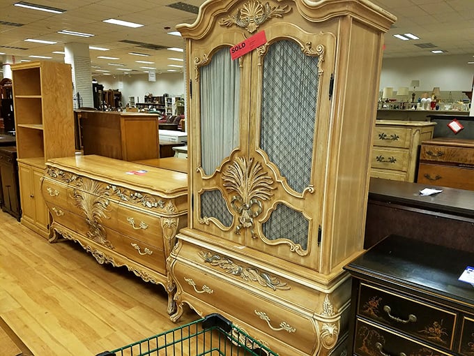 This ornate furniture set looks like it came straight from a French palace, or at least a very fancy bed and breakfast.