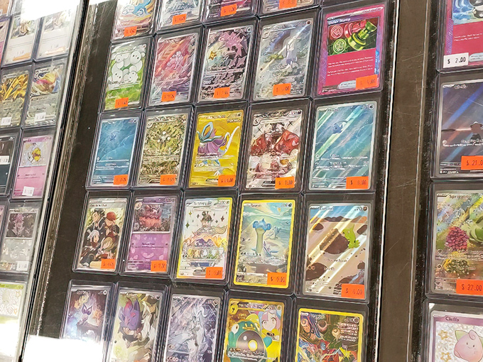 Pok&eacute;mon cards meticulously displayed in protective sleeves&mdash;proving that childhood pastimes can become serious collecting business for grown-ups.