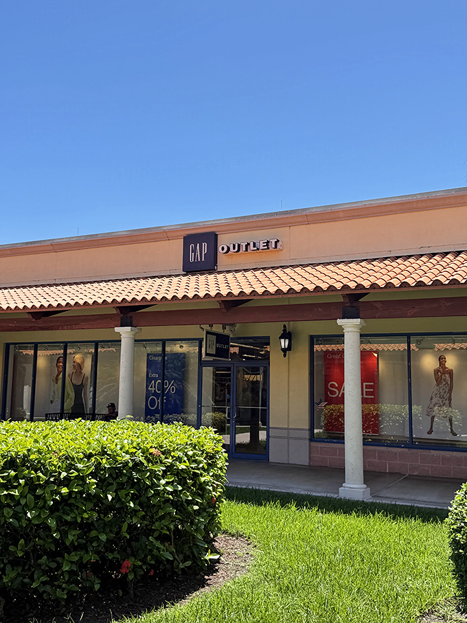 Gap's iconic navy signage stands out against terracotta roofing, a beacon of basics that somehow never go out of style.