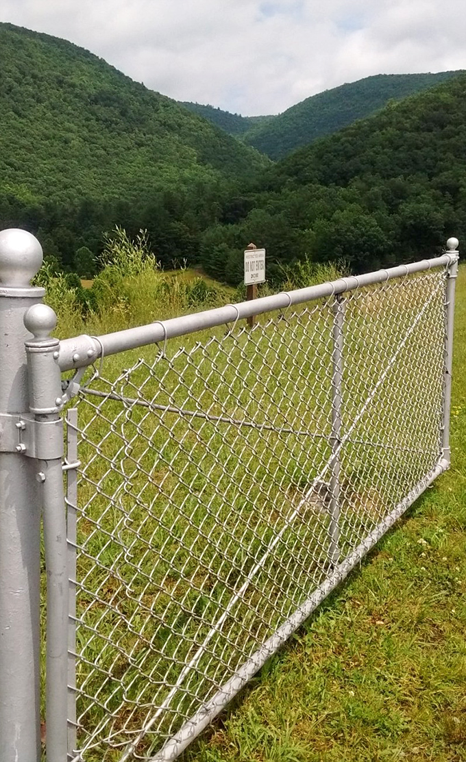 Beyond this unassuming gate lies a valley view that makes smartphone panoramas feel woefully inadequate and social media filters completely unnecessary.