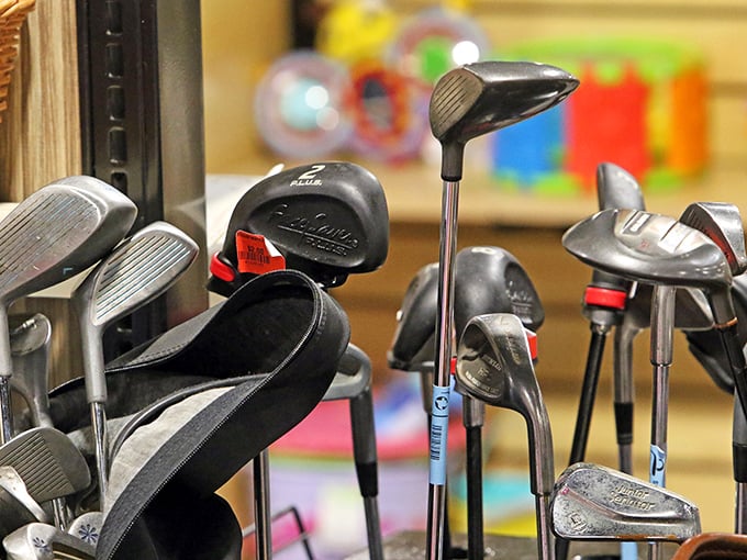 Golf clubs huddled together like old friends at a reunion. Each one has a tale of triumphant drives and embarrassing putts from their previous lives.
