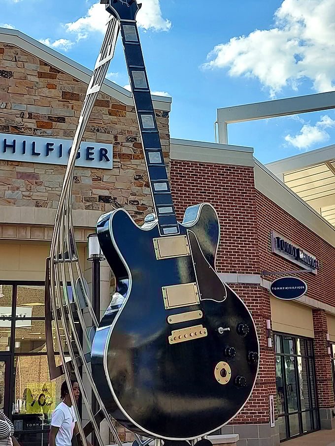 This giant guitar sculpture strikes a chord with shoppers, celebrating Mississippi's rich musical heritage while you hunt for deals.