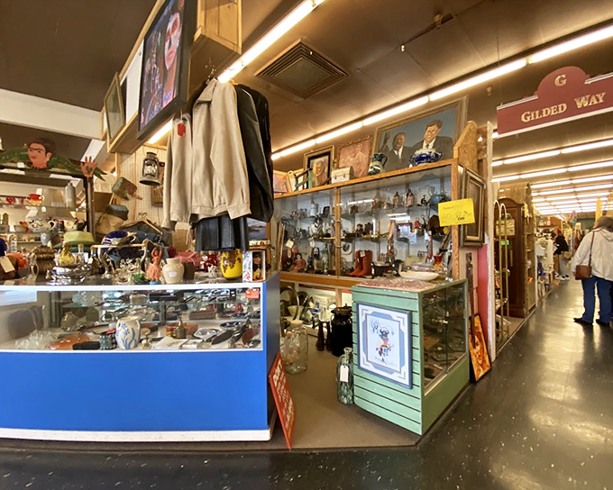 The "Gilded Way" booth offers a glimpse into an era when presidential portraits and curio cabinets were the height of sophisticated decor.