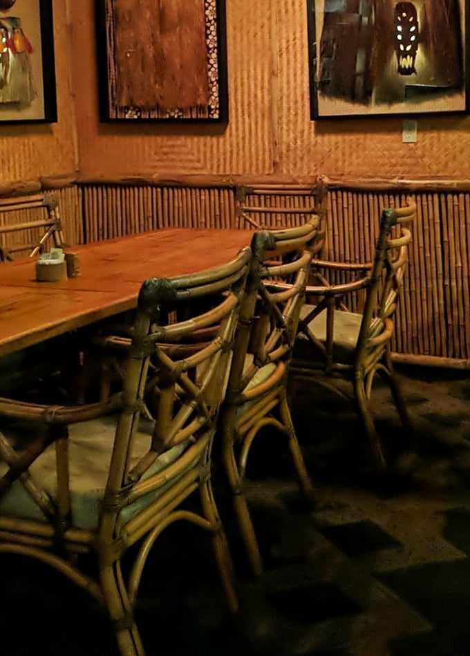 Bamboo details and warm lighting create ambiance that makes even Monday feel like Friday night.