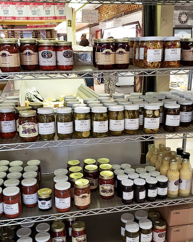 Amish-made preserves line the shelves like edible jewels, each jar capturing summer's bounty with recipes unchanged for generations.