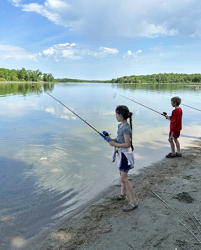 Fishing lessons that last a lifetime. These young anglers are learning patience pays off—sometimes with actual fish, always with precious memories.