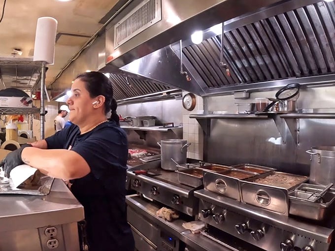 Behind the scenes magic happens in this kitchen, where sandwich artisans work their craft with the precision of Swiss watchmakers.