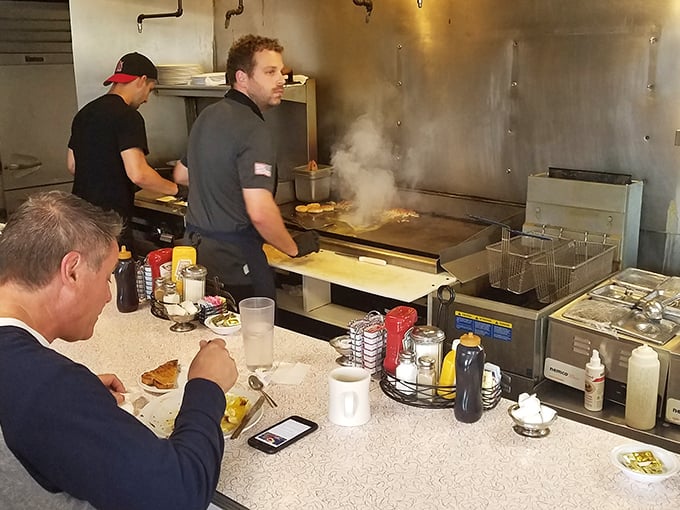 Behind the counter magic happens &ndash; skilled cooks orchestrating the breakfast ballet that's been perfected through decades of flipping, frying and serving.