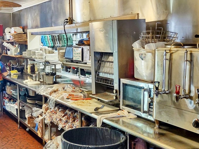 Behind the scenes where breakfast magic happens. This kitchen has likely seen more eggs cracked than an action movie stunt team.