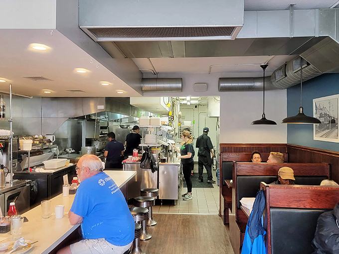 The open kitchen layout lets you watch the breakfast magic happen, where skilled cooks work with impressive efficiency daily.