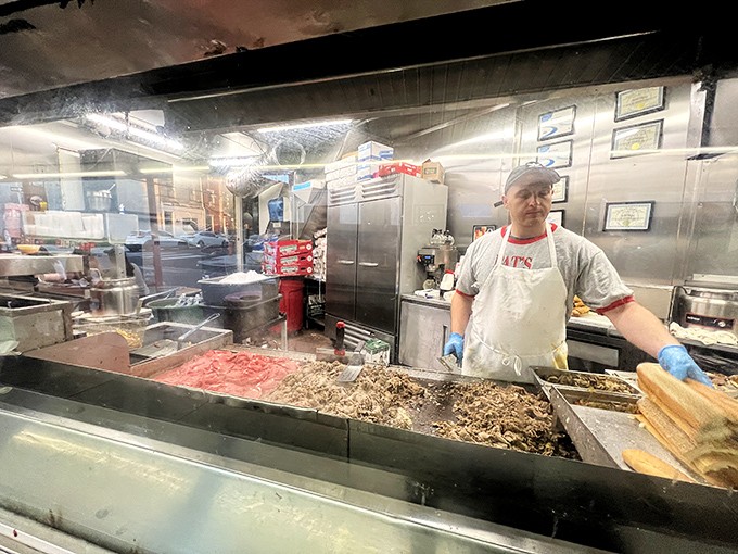 Behind every great cheesesteak is a grill master with the timing of a Swiss watch and the spatial awareness of an air traffic controller.