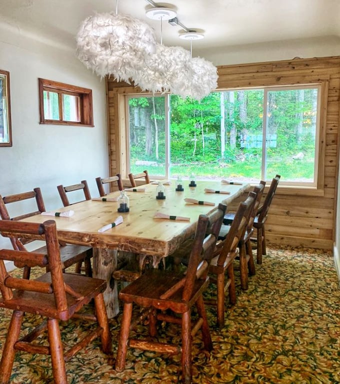 A private dining space where the forest views compete with feathery light fixtures for your attention, but food will win every time.