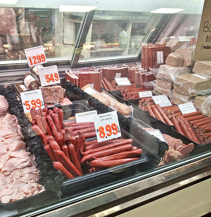 Meat counter magnificence where sausages line up like delicious soldiers ready to march straight into your weekend cookout plans.