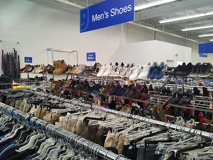 Men's shoes lined up like hopeful contestants, each pair waiting for that Cinderella moment when the right shopper comes along.