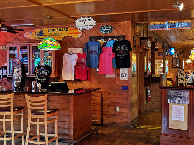 Surfboards and seafood&mdash;a coastal marriage made in heaven. The merch display reminds you to take home a t-shirt when your stomach is full.
