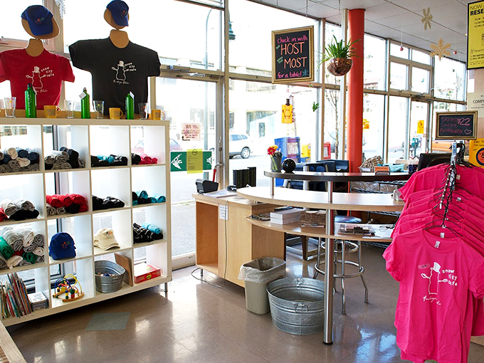 The merch corner: where you can take home a souvenir that lasts longer than the memory of that incredible breakfast. Almost.