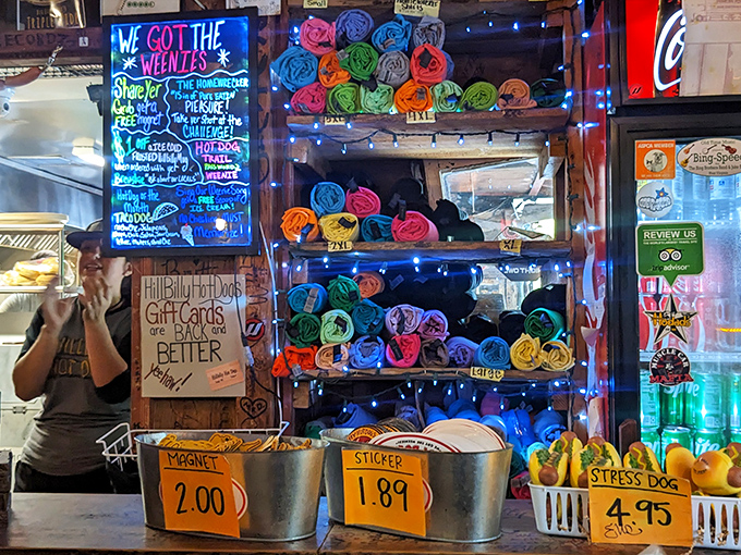 "We Got The Weenies" glows in neon brilliance while colorful t-shirts await. Souvenirs that answer the eternal question: "What did you bring me from West Virginia?"