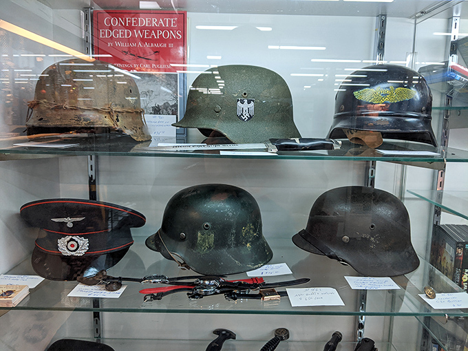 History under glass&mdash;military helmets that silently speak volumes about the past. Each dent and scratch tells a different story.