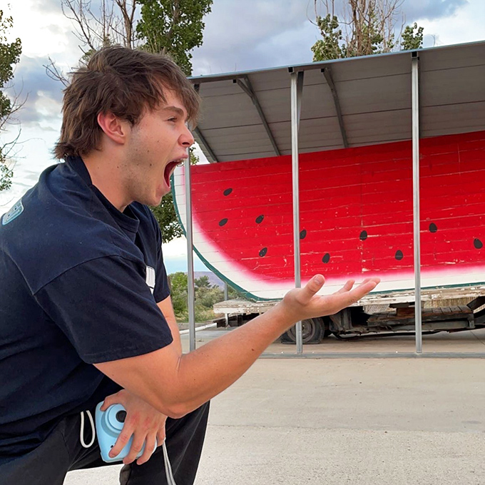 The only appropriate reaction when confronting a slice of watermelon bigger than your car&mdash;pure, unfiltered roadtrip joy.