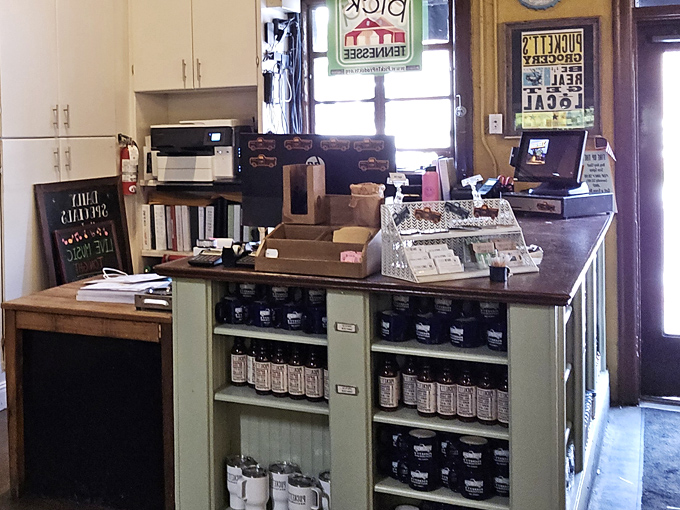 The checkout counter doubles as a mini-market of local treasures. In the South, hospitality means making sure you can take a taste of home with you.