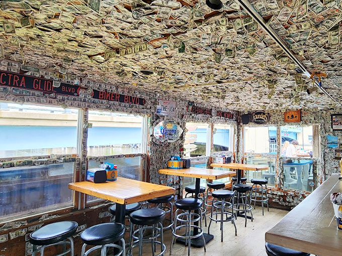 Another angle reveals the dollar-lined walls telling stories of countless "I'll definitely be back" promises actually kept.