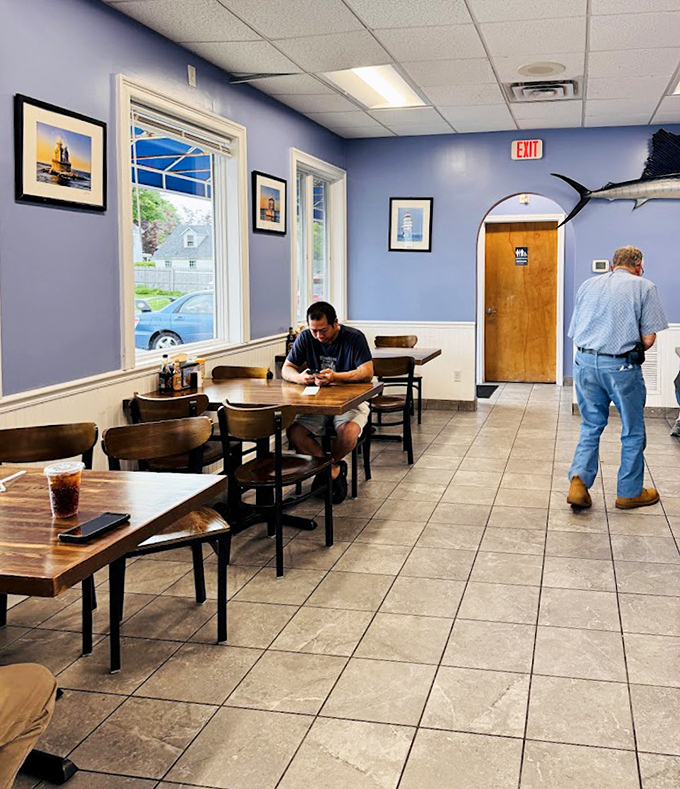 The dining room's blue walls and wooden tables create that rare atmosphere &ndash; casual enough for sandy feet but nice enough for a celebration.