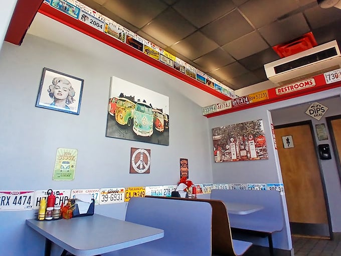 License plates and pop culture memorabilia line the walls, creating that "I've-been-collecting-these-since-forever" vibe.