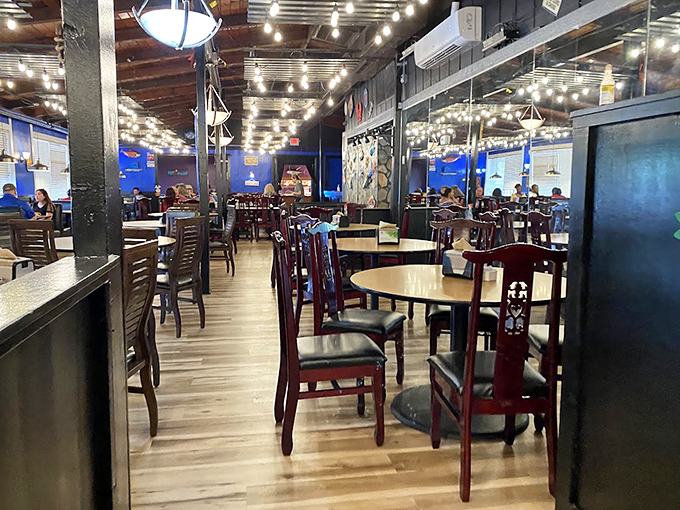 The dining room's string lights create the perfect atmosphere for the serious business of all-you-can-eat seafood consumption.