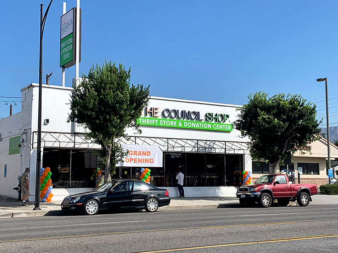 The clean white exterior with bold signage stands out on Magnolia Boulevard. A charitable project that makes both your home and conscience feel good.
