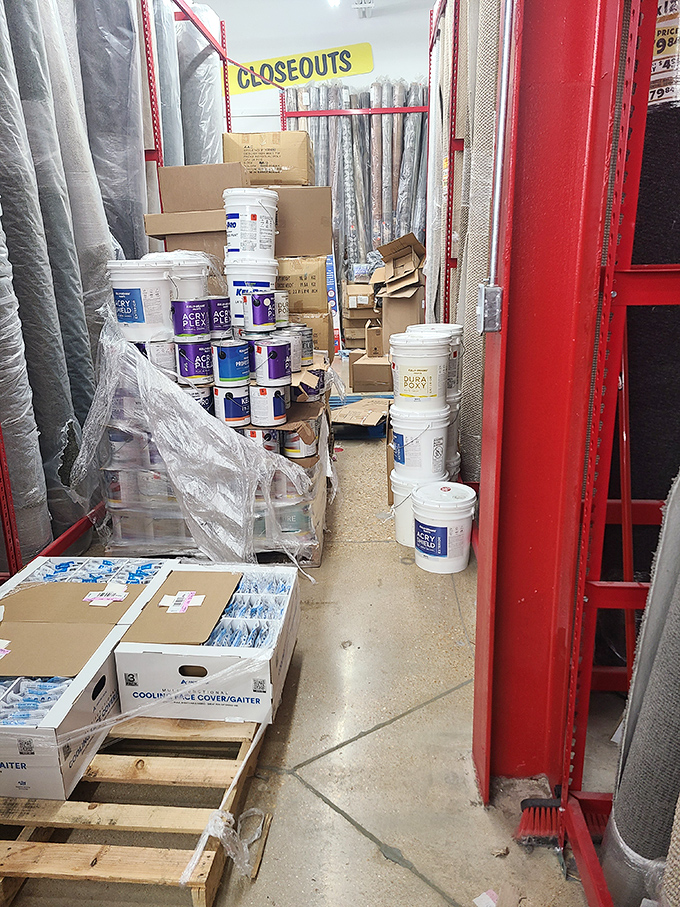 Paint supplies and home improvement materials stacked with the beautiful chaos of possibility &ndash; weekend projects begin their journey here.