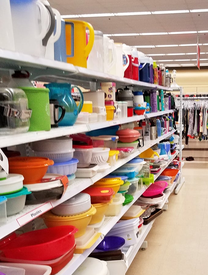A rainbow of kitchen containers promising organization nirvana. The plastic aisle: where good intentions for meal prep and leftovers are born.