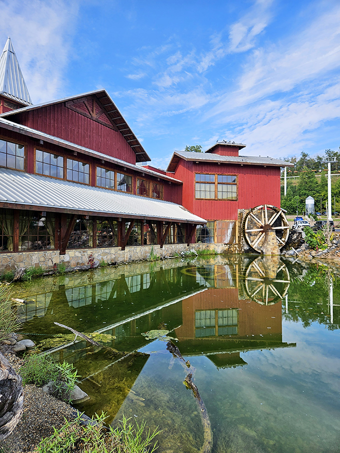 The peaceful pond and water wheel outside prove that even restaurants deserve their own scenic vacation spots.