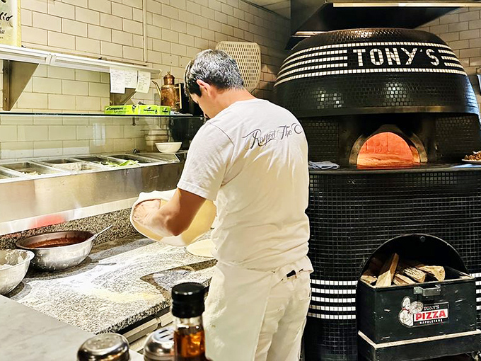 Watching dough transform into pizza perfection is like seeing alchemy in action&mdash;flour, water, and fire becoming edible art.