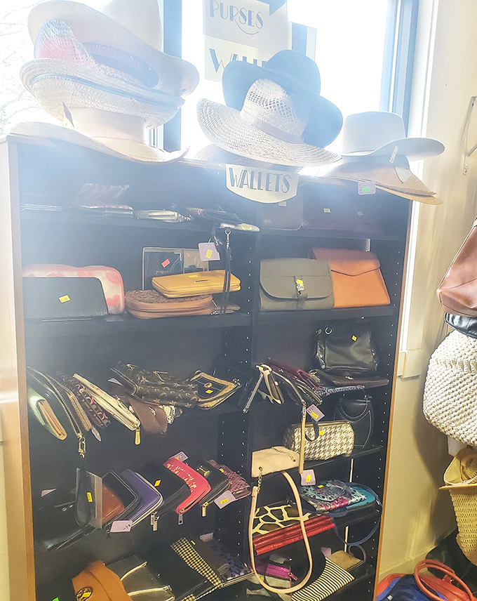The accessories corner: where summer hats and structured purses wait patiently for their second act in someone else's fashion story.