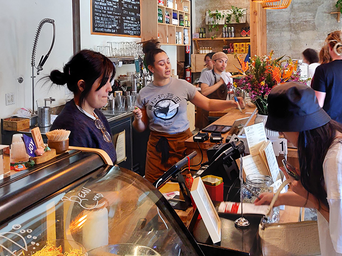 The bustling counter scene proves good things come to those who queue up with patience and appetite.