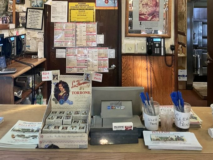 The front counter – where takeout dreams begin and the aroma of garlic bread follows you home.