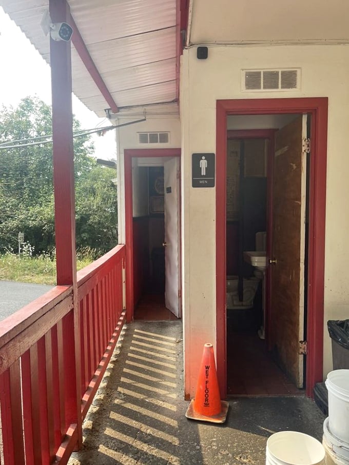 The restroom hallway that's seen more "just one more bite" moments than it can count.