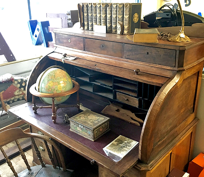 This roll-top desk has probably seen more secrets than a therapist&mdash;its cubbyholes and drawers perfect for hiding love letters or tax receipts.