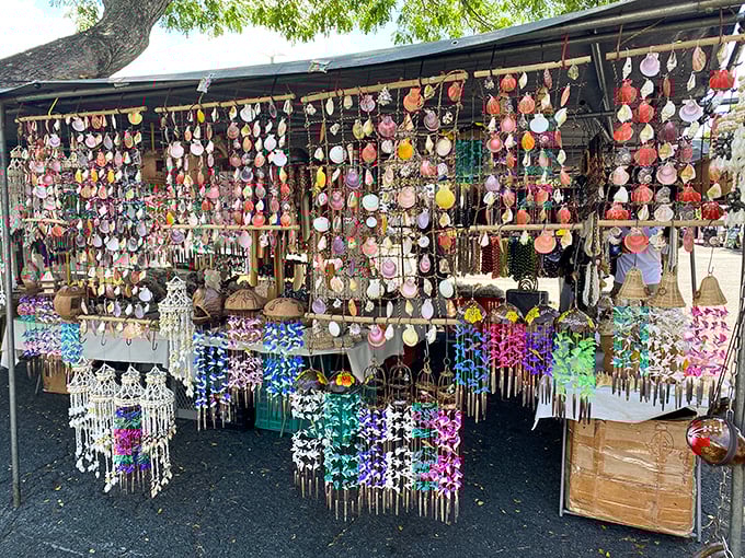 A mesmerizing display of shell wind chimes and colorful mobiles &ndash; beach house decor that brings the sound of paradise home.
