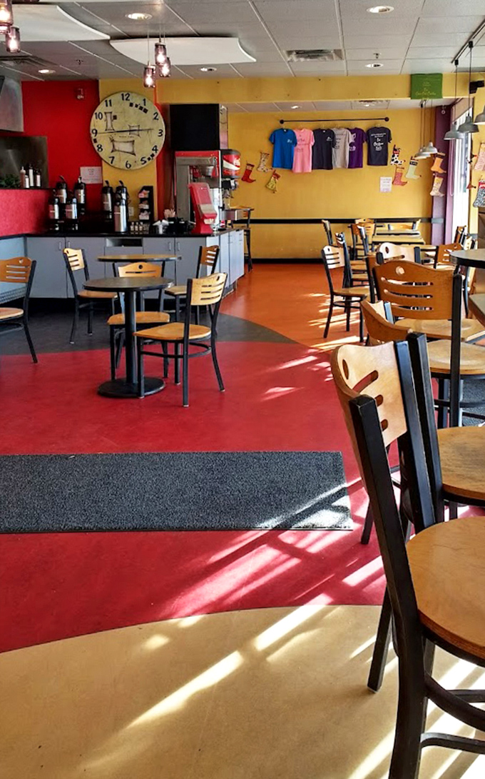 The cheerful yellow walls and red floor create a sunny disposition, even before the caffeine kicks in. 