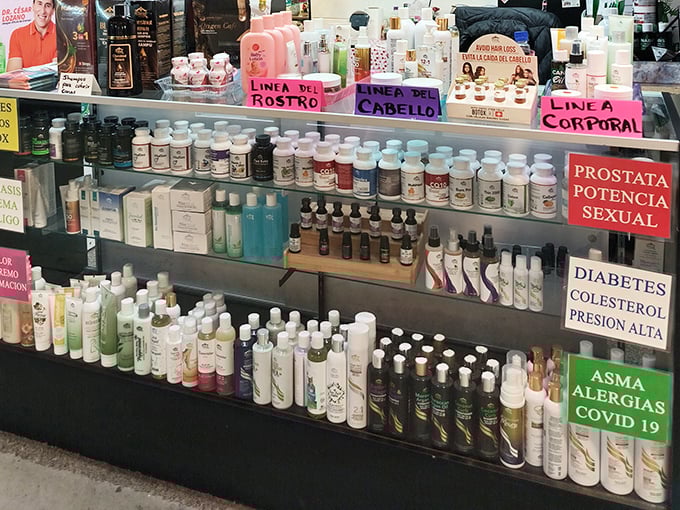 A pharmacy of hope in tiny bottles, where remedies for everything from hair loss to heartache line the shelves in colorful formation.