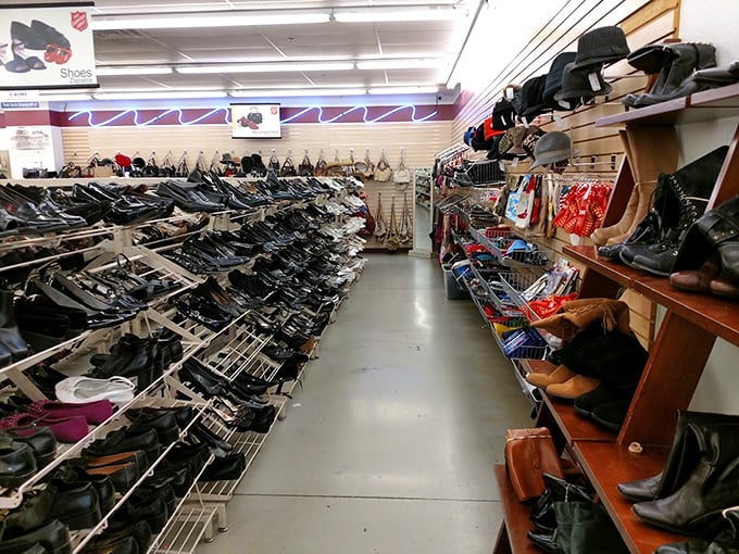 The shoe aisle: a footwear library where every pair tells a story, from barely-worn wedding heels to gently-loved hiking boots.