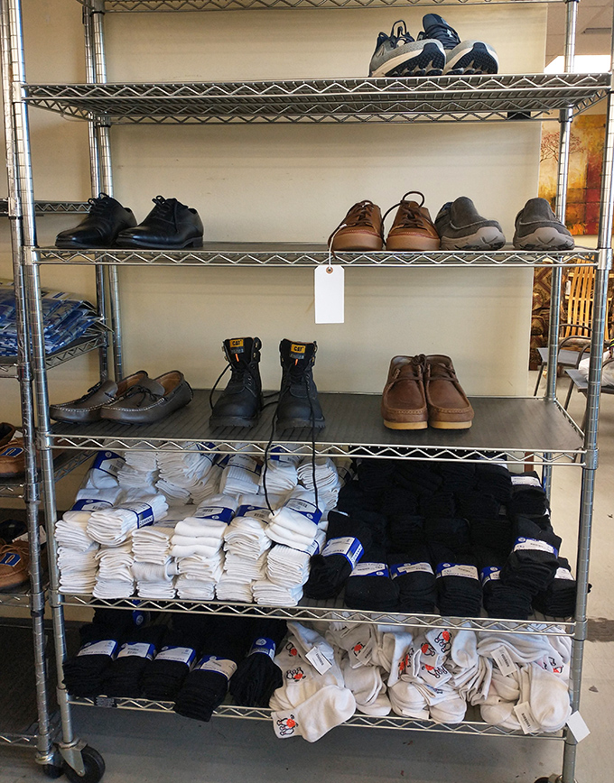 Men's footwear and fresh socks await new journeys&mdash;from work boots to loafers, each pair holds possibilities for paths not yet taken.