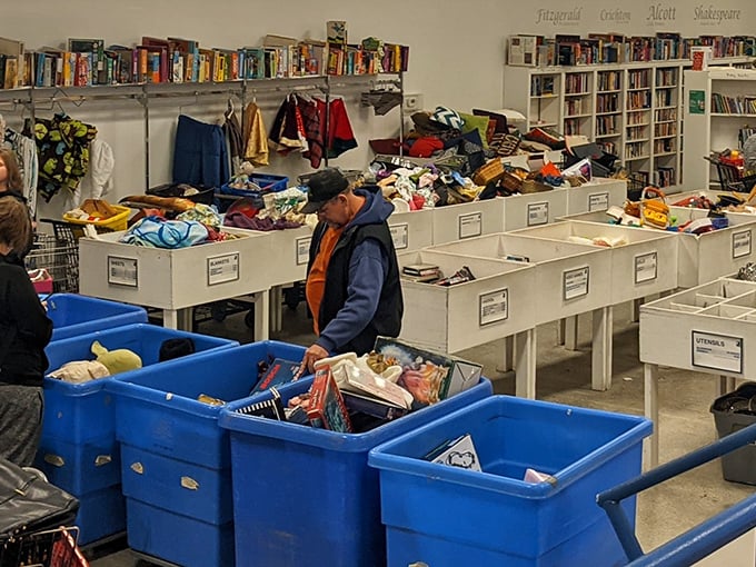 Serious thrifters in their natural habitat, methodically mining through bins like paleontologists at a promising dig site.