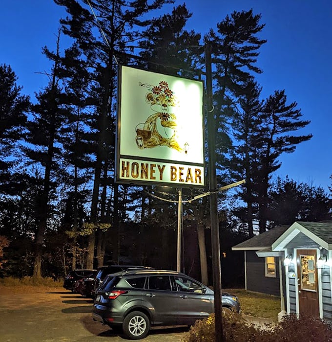 The illuminated sign stands like a beacon in the Northwoods night, guiding hungry travelers to salvation one chicken sandwich at a time.
