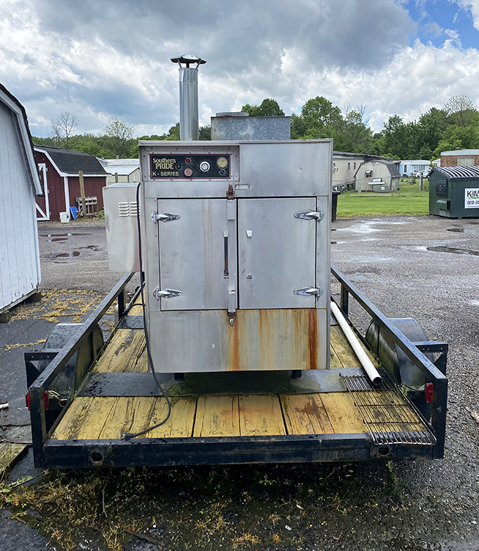 The real star of the show: a battle-tested smoker that's seen more meat than a butcher's convention.